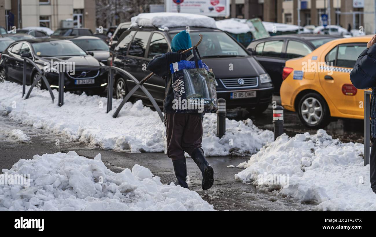 Cars covered in snow, first day of winter in Bucharest City, Romania ...
