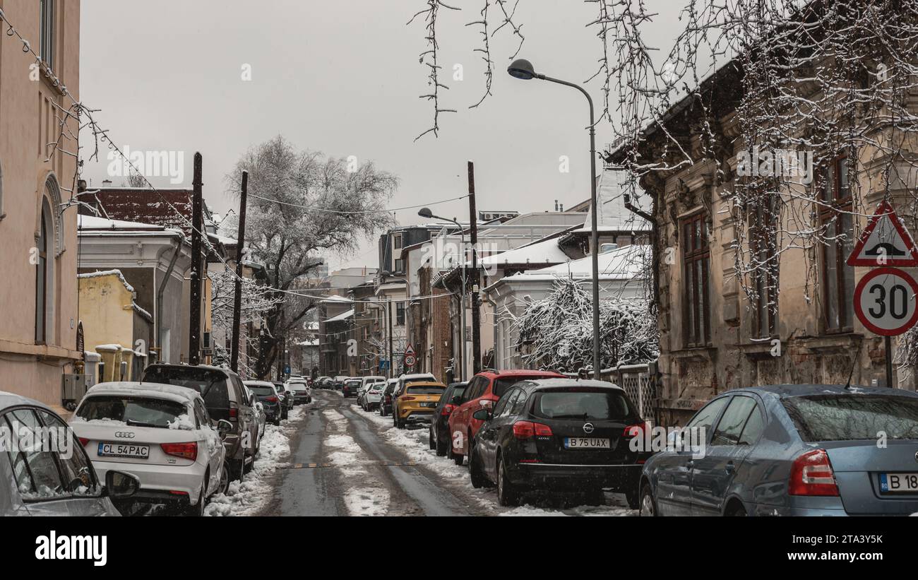 Cars covered in snow, first day of winter in Bucharest City, Romania ...
