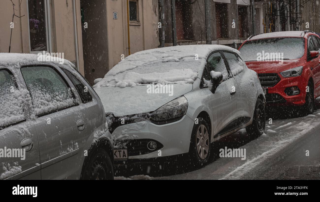 Cars covered in snow, first day of winter in Bucharest City, Romania ...