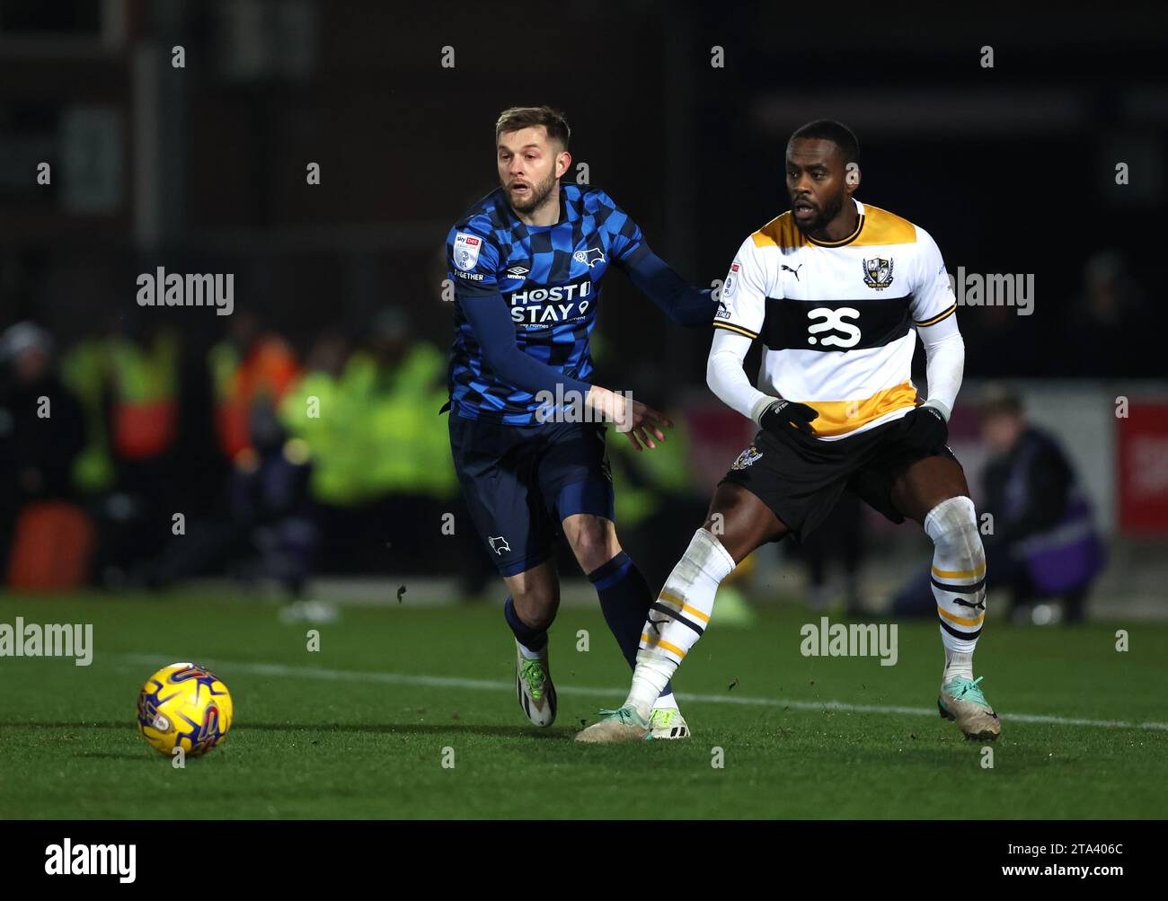 Derby County's Tom Barkhuizen (left) and Port Vale's Gavin Massey ...