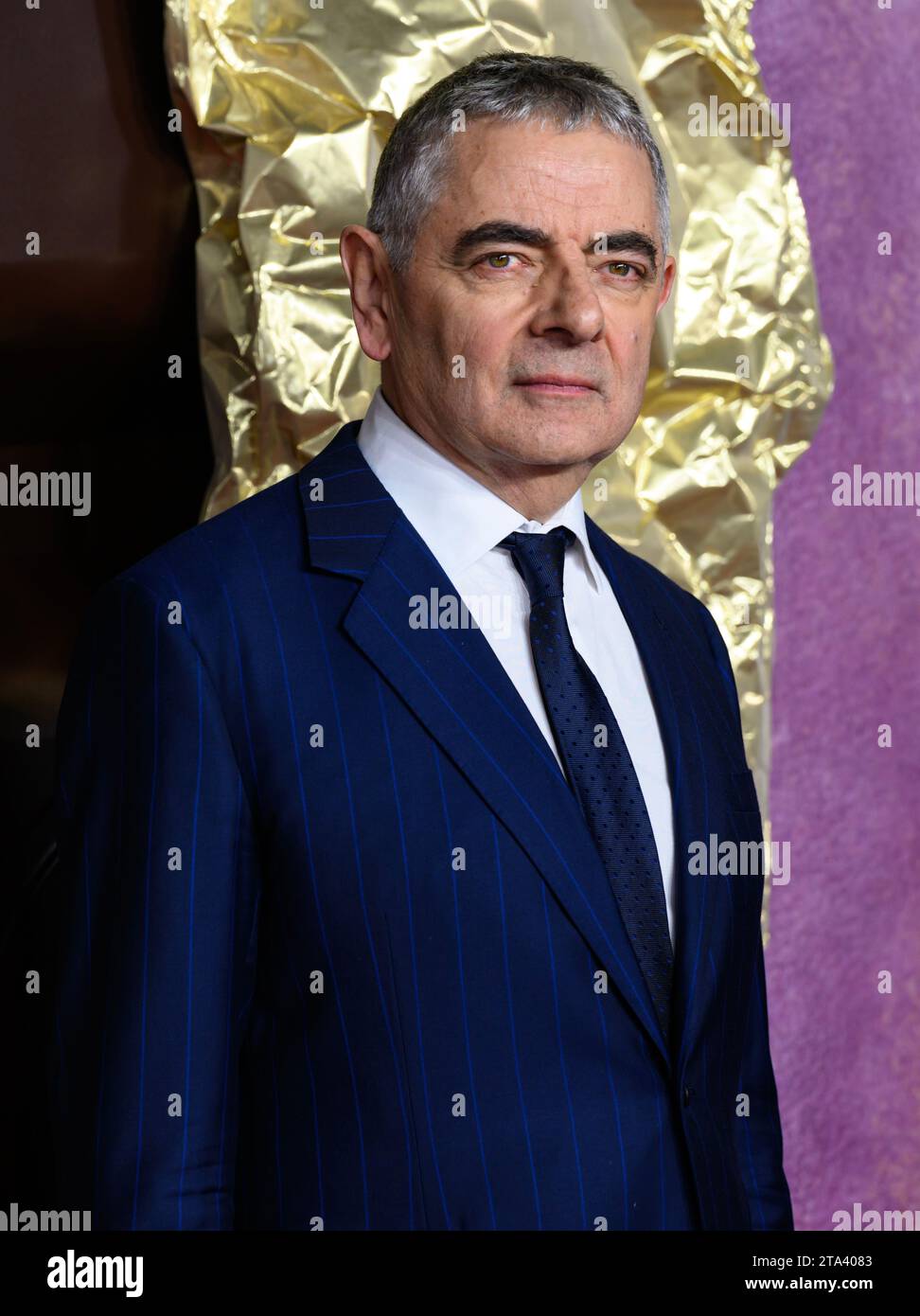 London, UK. November 28th, 2023. Rowan Atkinson arriving at the Wonka ...