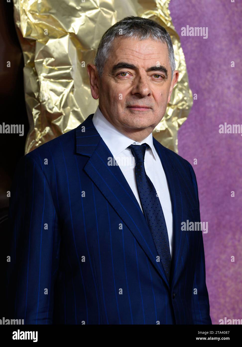London, UK. November 28th, 2023. Rowan Atkinson arriving at the Wonka ...