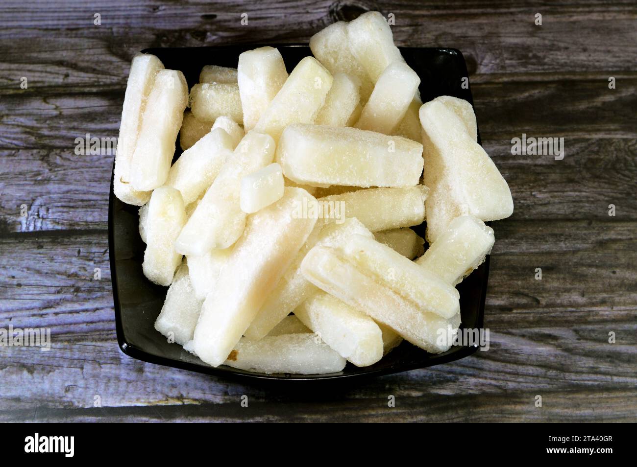 Fresh raw uncooked squid, a mollusc with an elongated soft body, large ...