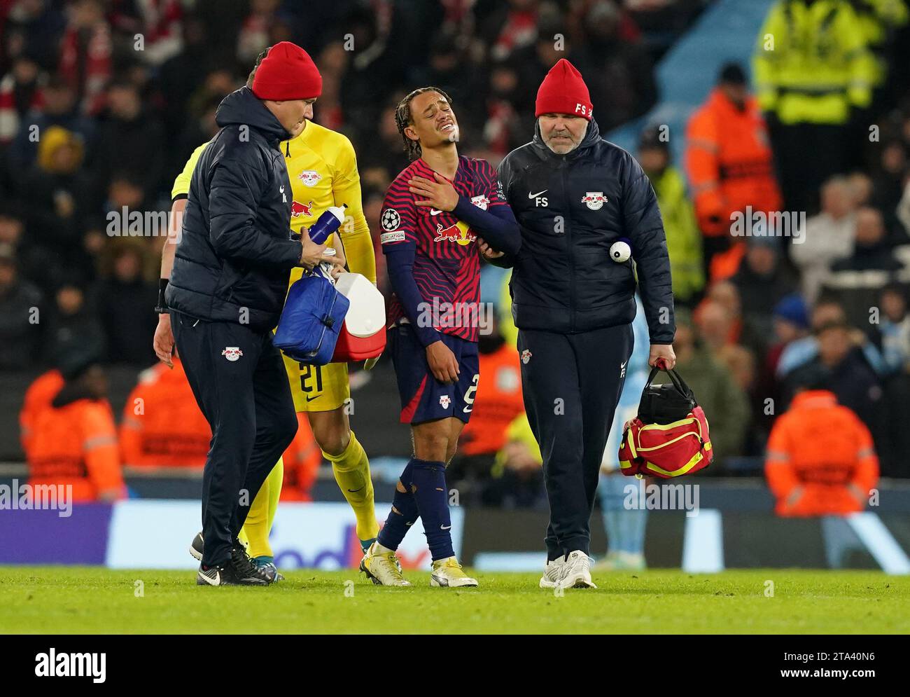 RB Leipzig's Xavi Simons walks off injured during the UEFA Champions ...
