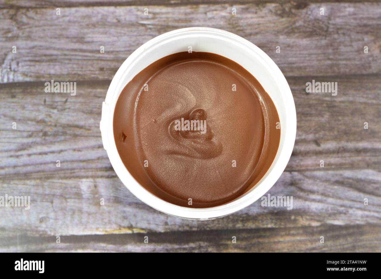 sweetened hazelnut cocoa spread, chocolate nougat cream, texture of melted chocolate paste used ...