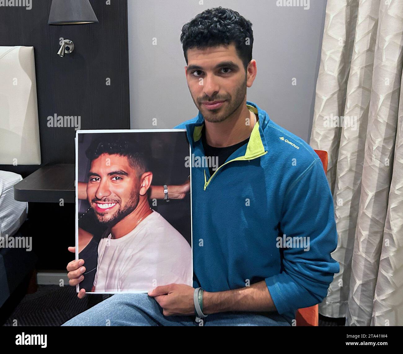 Ilay David, 26, at the DoubleTree by Hilton London hotel, holding a ...