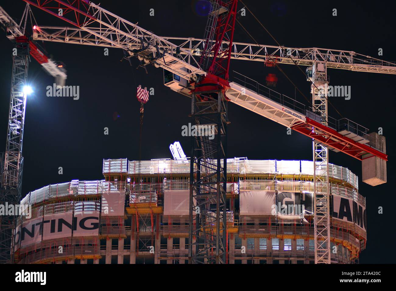 High rise building under construction. Installation of glass facade ...