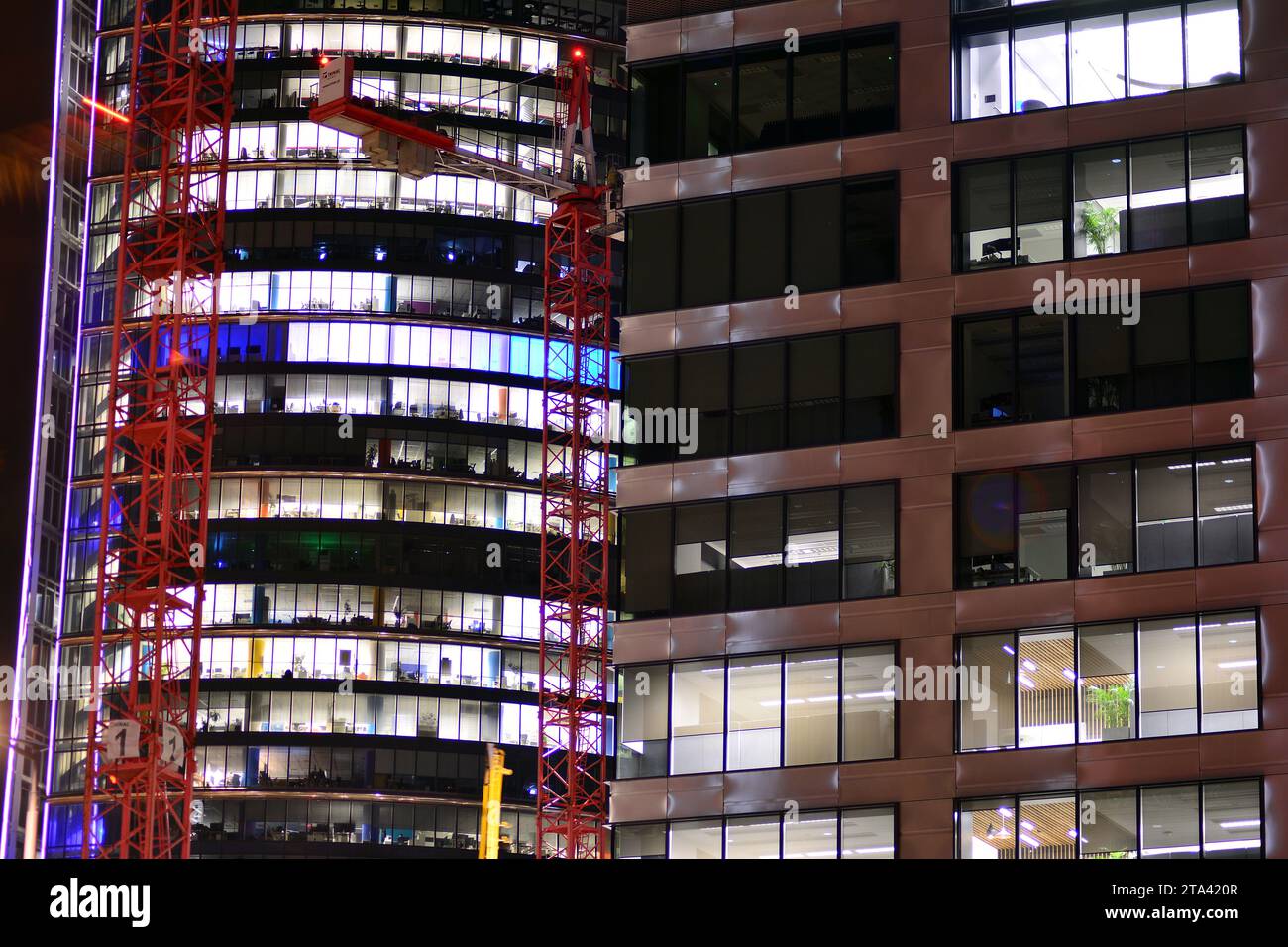 High rise building under construction. Installation of glass facade ...