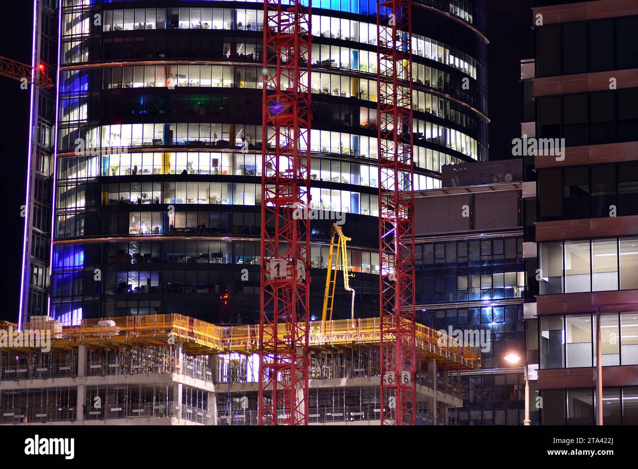 High rise building under construction. Installation of glass facade ...