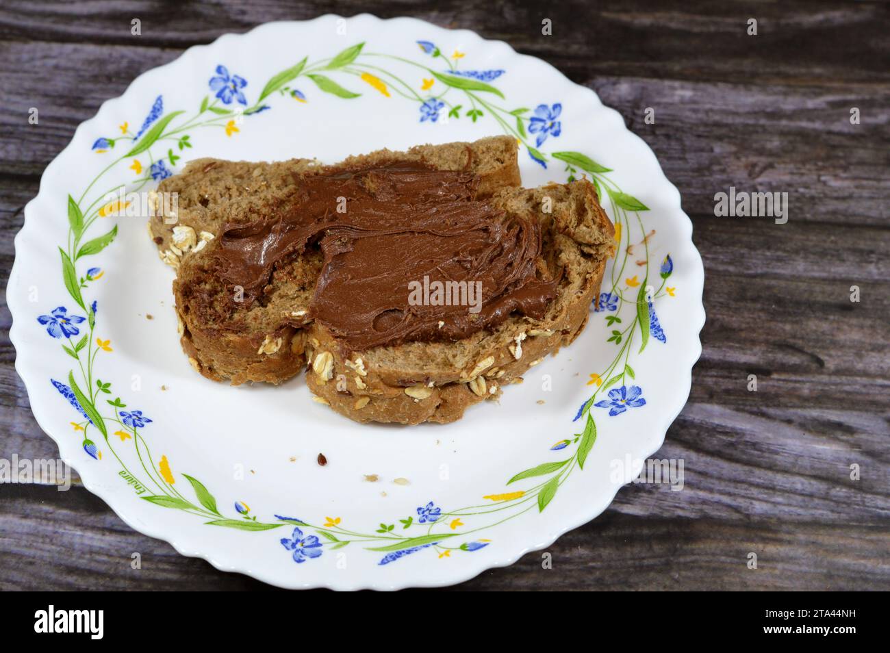 A wheat oat fresh baked piece toast cut oats and sesame, The oat (Avena ...