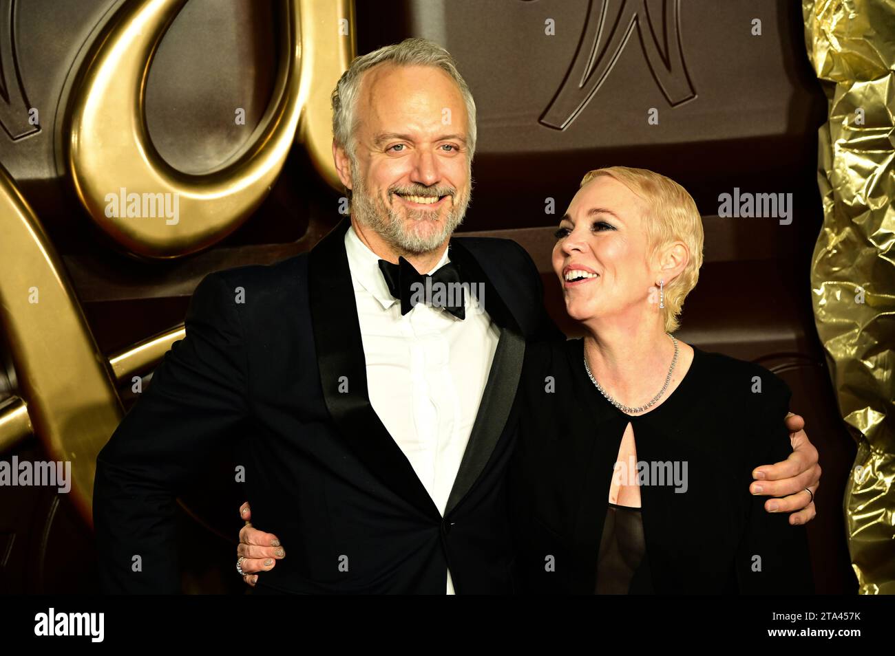 London, UK. 28th Nov, 2023. Ed Sinclair and Olivia Colman attends the ...