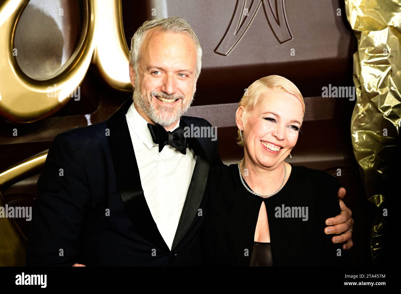London, UK. 28th Nov, 2023. Ed Sinclair and Olivia Colman attends the ...
