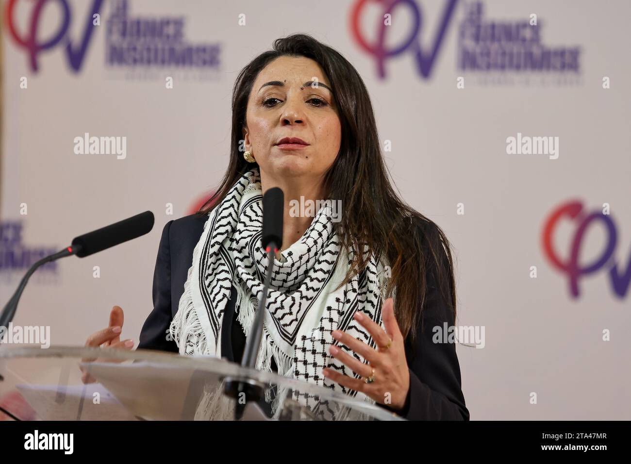 Hala Abou Hassira, Palestinian ambassador to France, speaks during the peace meeting which took ...