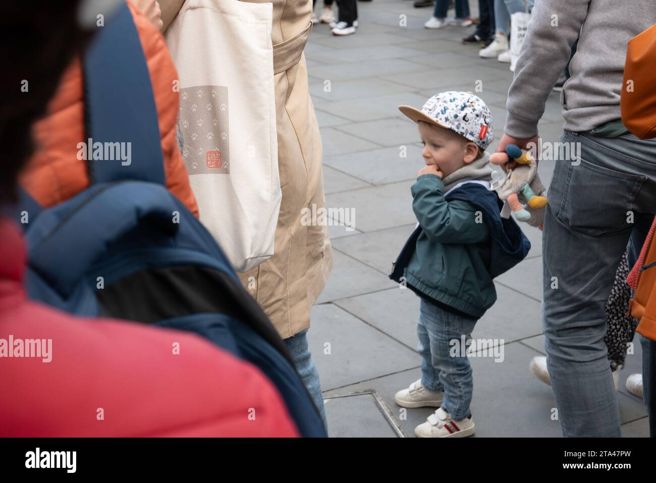 Little boy in crowd Stock Photo - Alamy