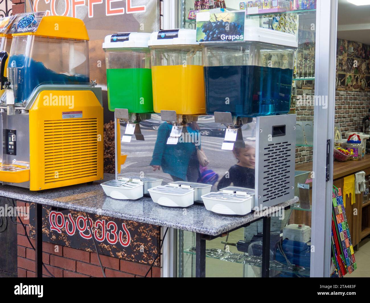 Batumi, Georgia. 11.26.2023 Vending machine with soft drinks and ice ...