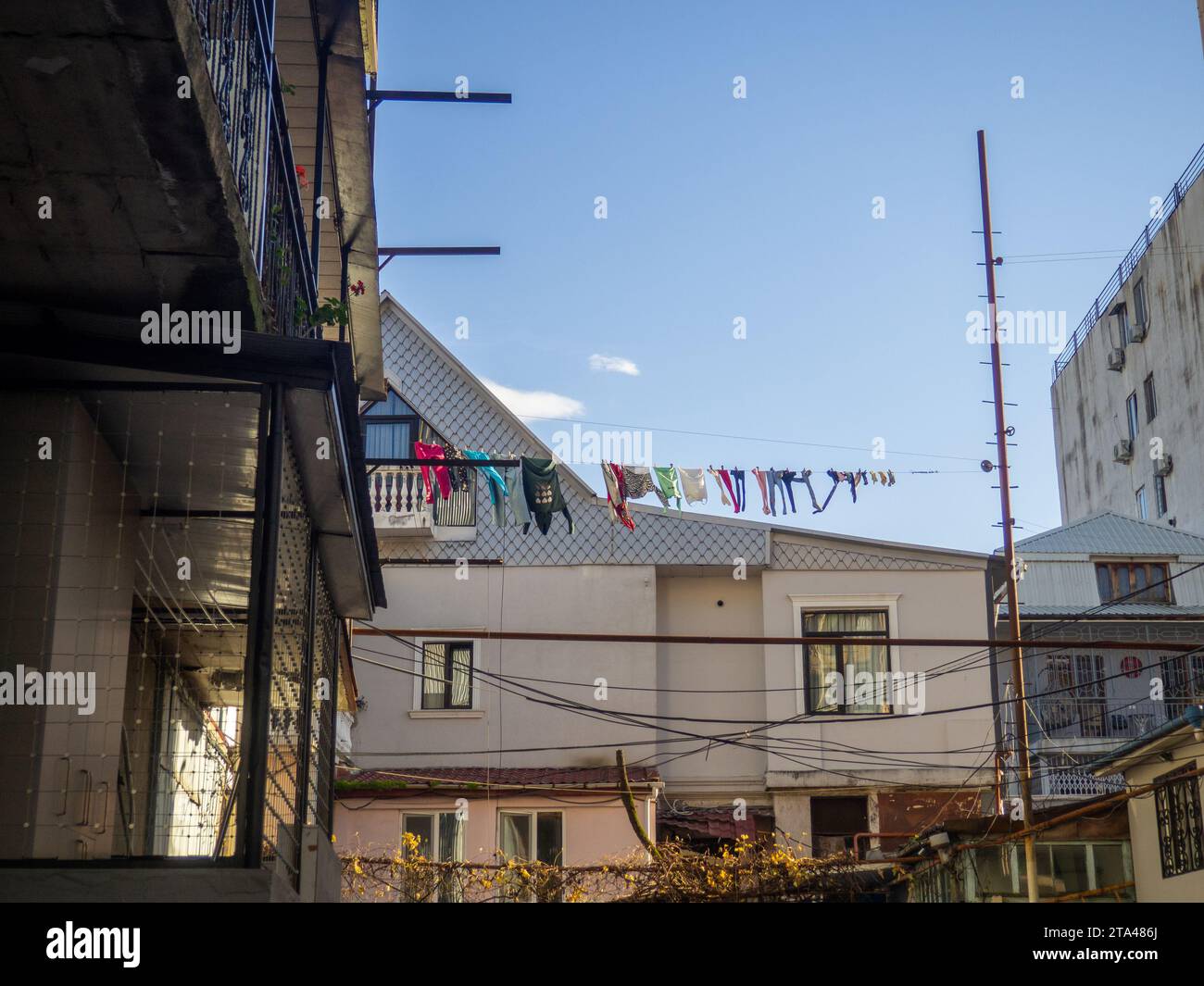 Clothes drying in the wind on a clothes line hi-res stock photography ...