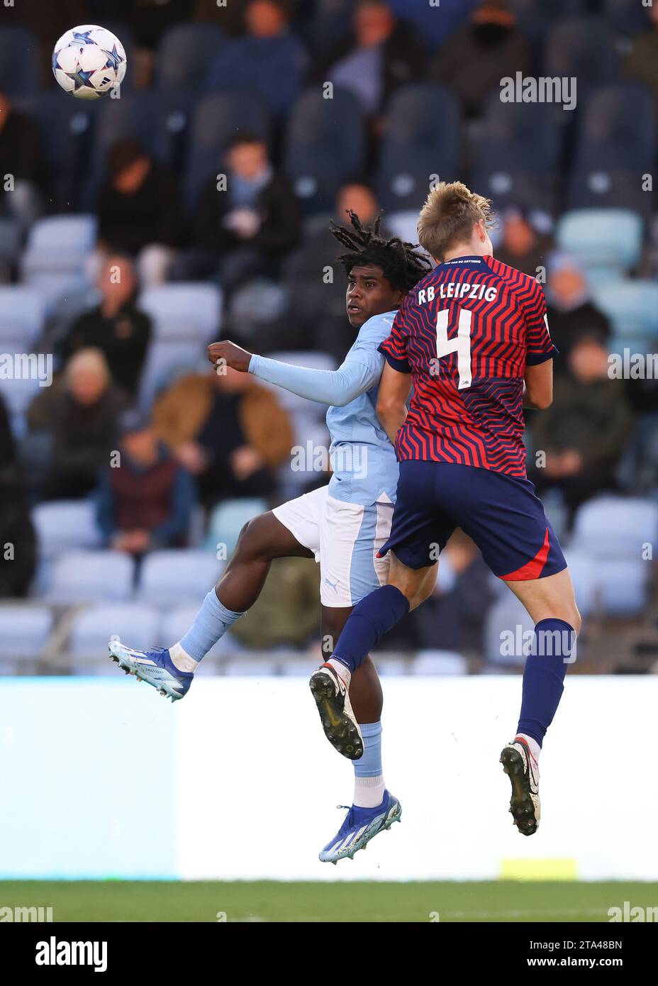 Manchester, UK. 28th Nov, 2023. Jonathan Norbye of RB Leipzig and Jaden ...