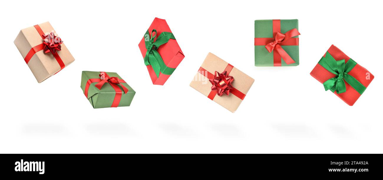 Flying Christmas gifts on white background Stock Photo - Alamy