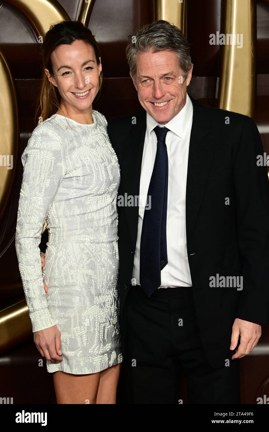 London, UK. 28th Nov, 2023. Anna Elisabet Eberstein and Hugh Grant ...