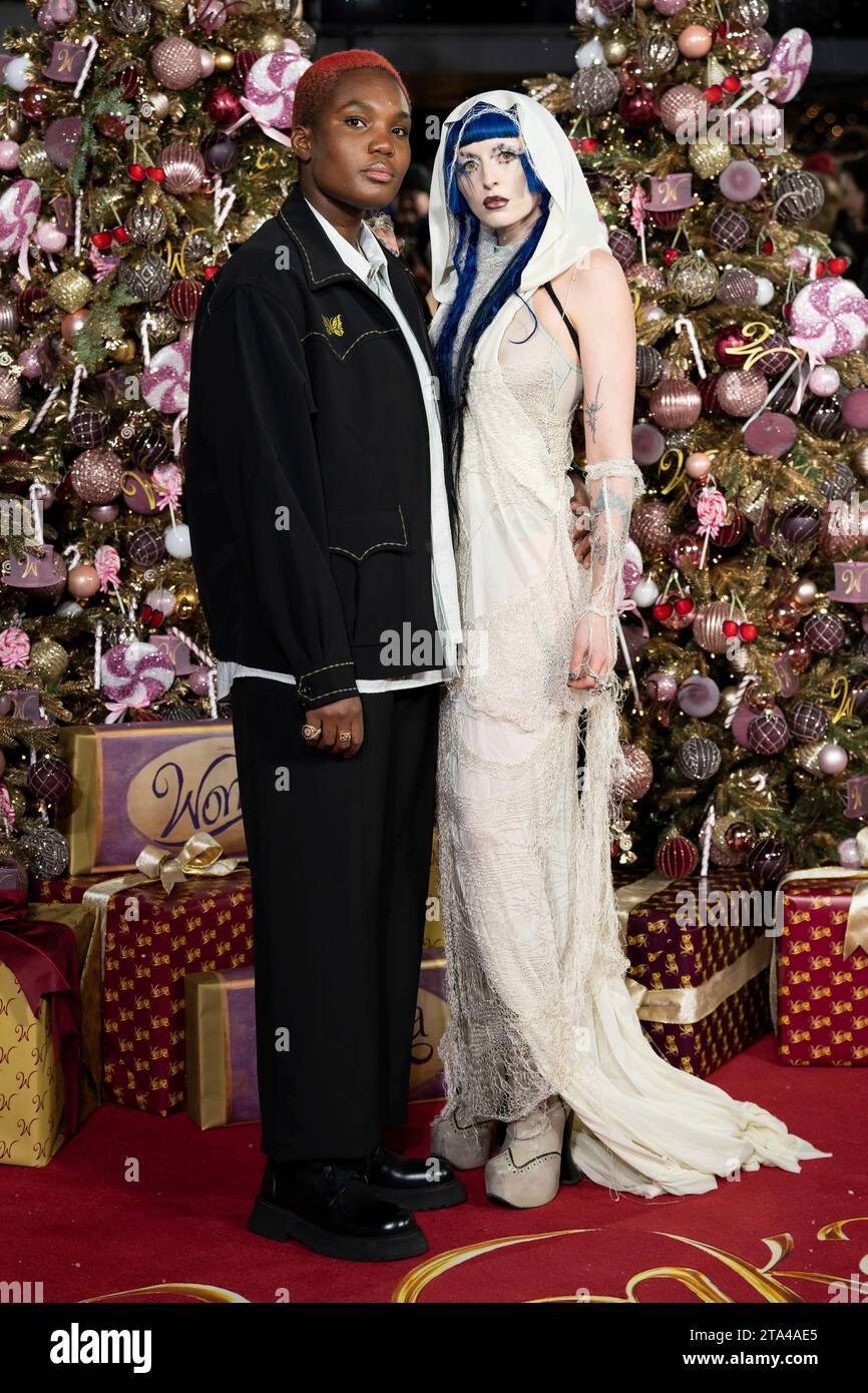 Arlo Parks, left, and Ash Nikko pose for photographers upon arrival at ...