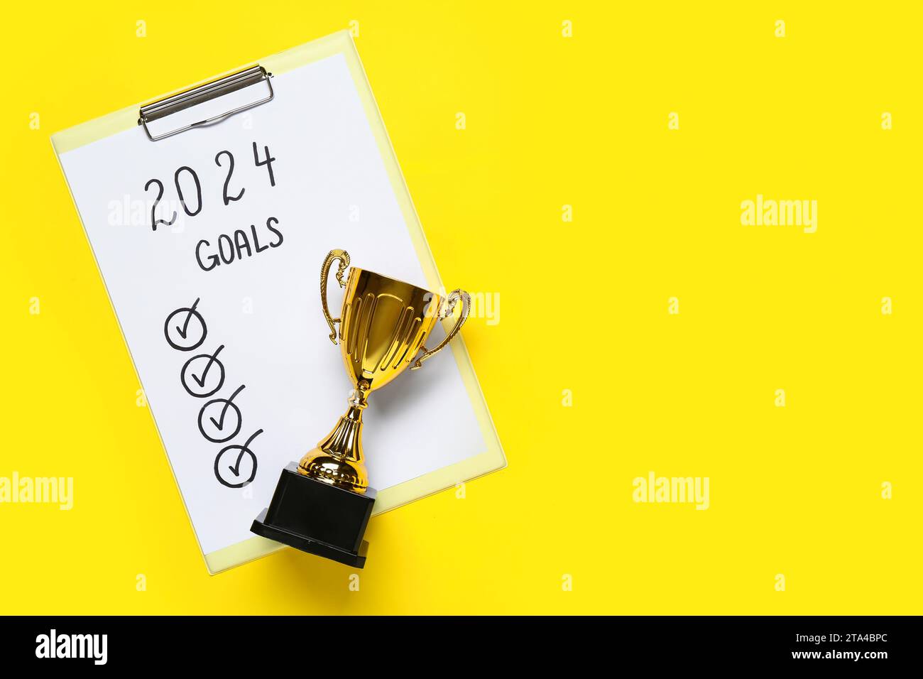 Paper sheet with empty to do list and goblet on yellow background Stock ...