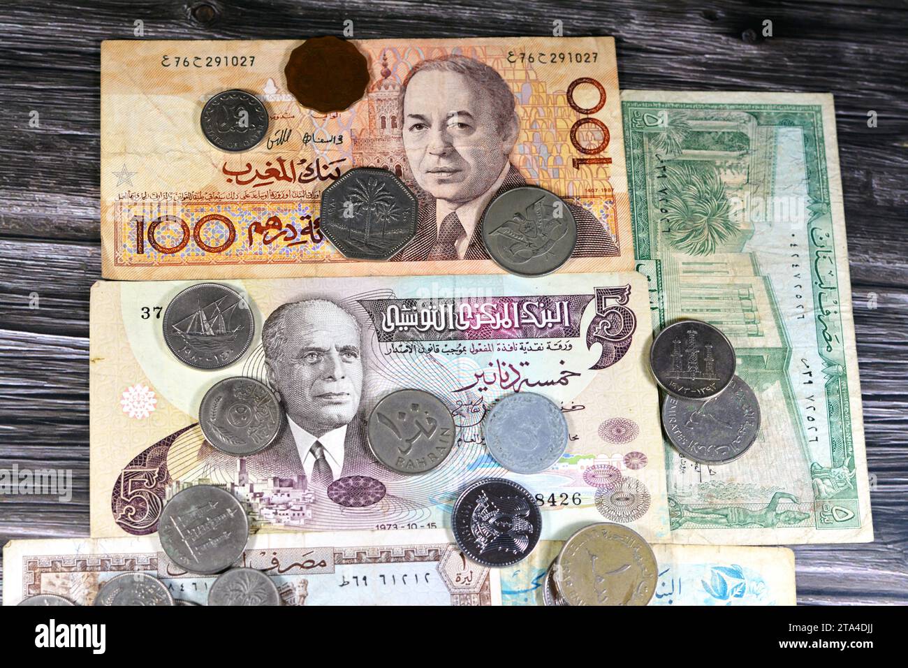Collection of Old Arabian money banknotes and coins from different ...