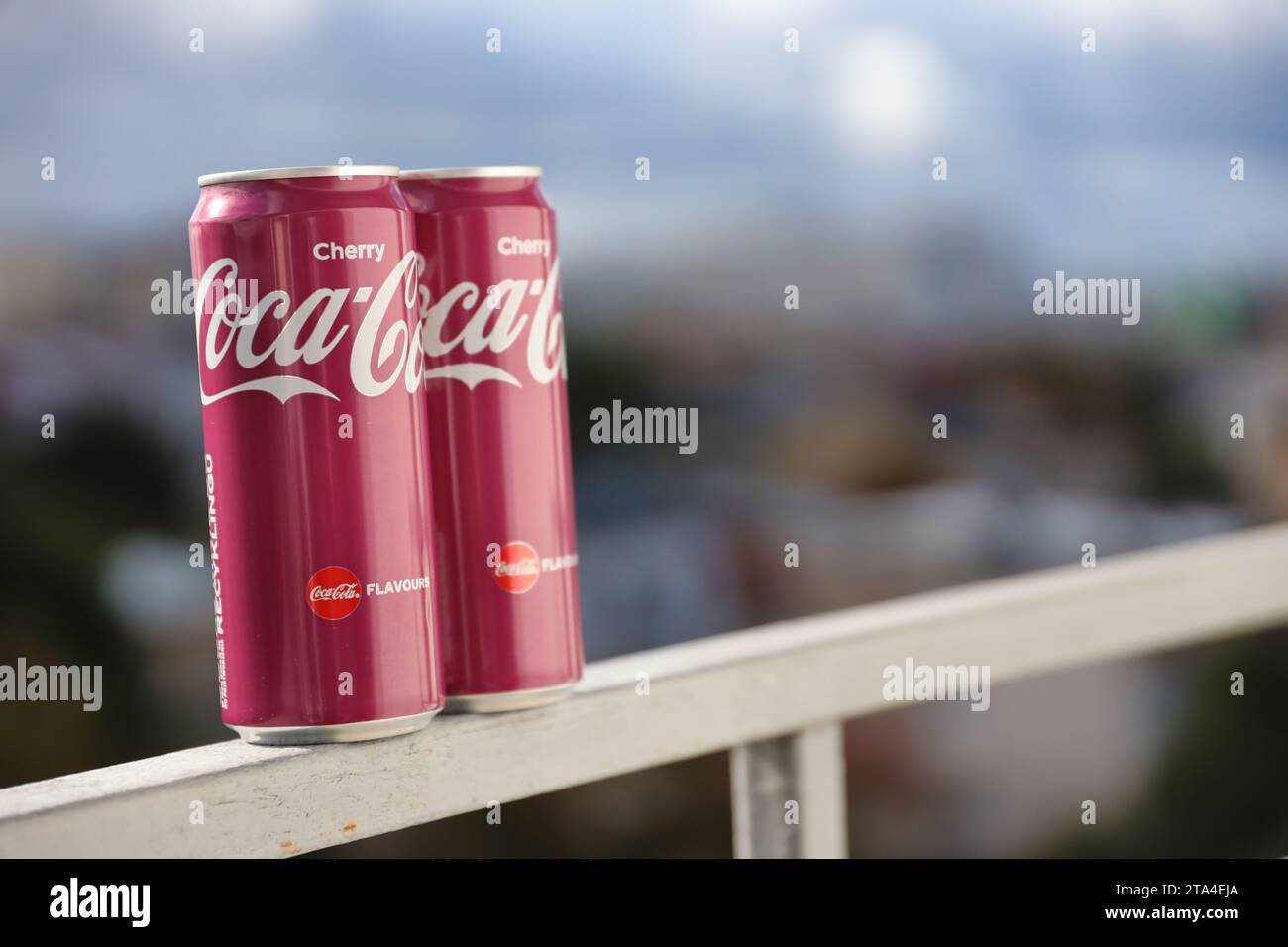 KYIV, UKRAINE - 4 MAY, 2023: Coca cola soft drinks brand tin cans with ...