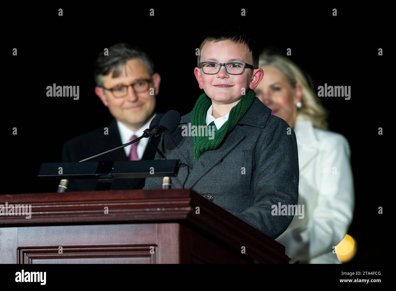 Washington, USA. 28th Nov, 2023. Tree lighter and fourth-grade student ...