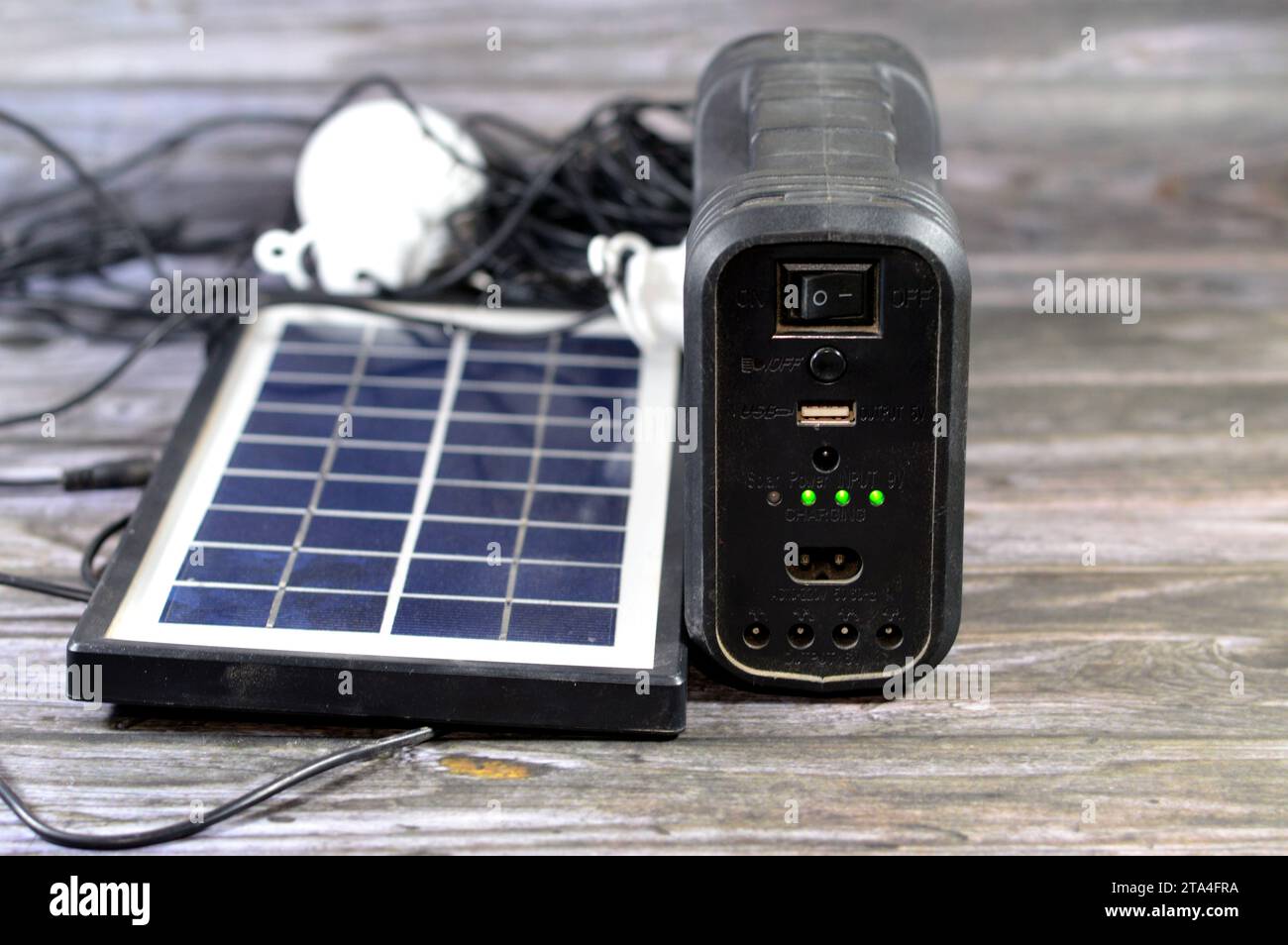 A multi purpose battery charged with a solar panel, a device that ...