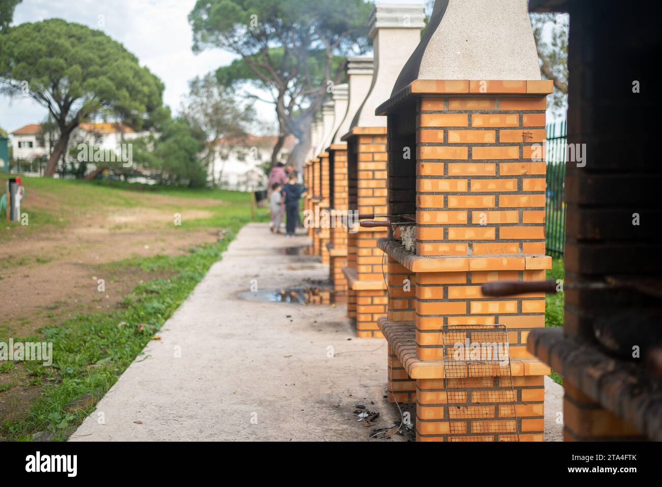 Public BBQ used for outdoor cooking. An outdoor cooking structure ...