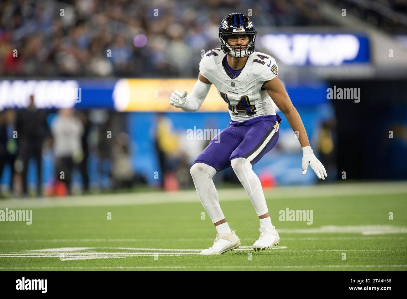 Baltimore Ravens safety Kyle Hamilton (14) takes his stance during an ...