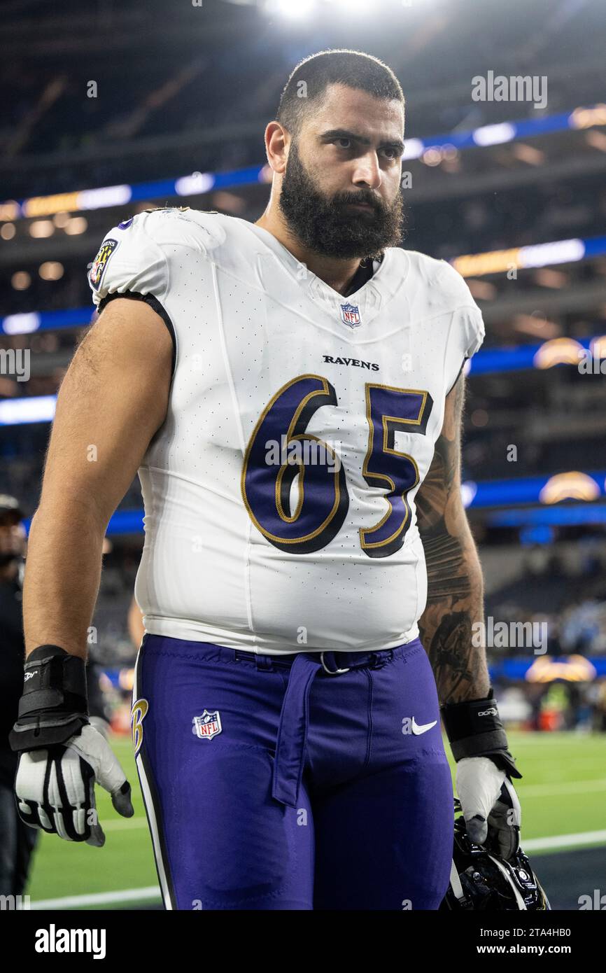 Baltimore Ravens guard Patrick Mekari (65) walks back to the locker ...