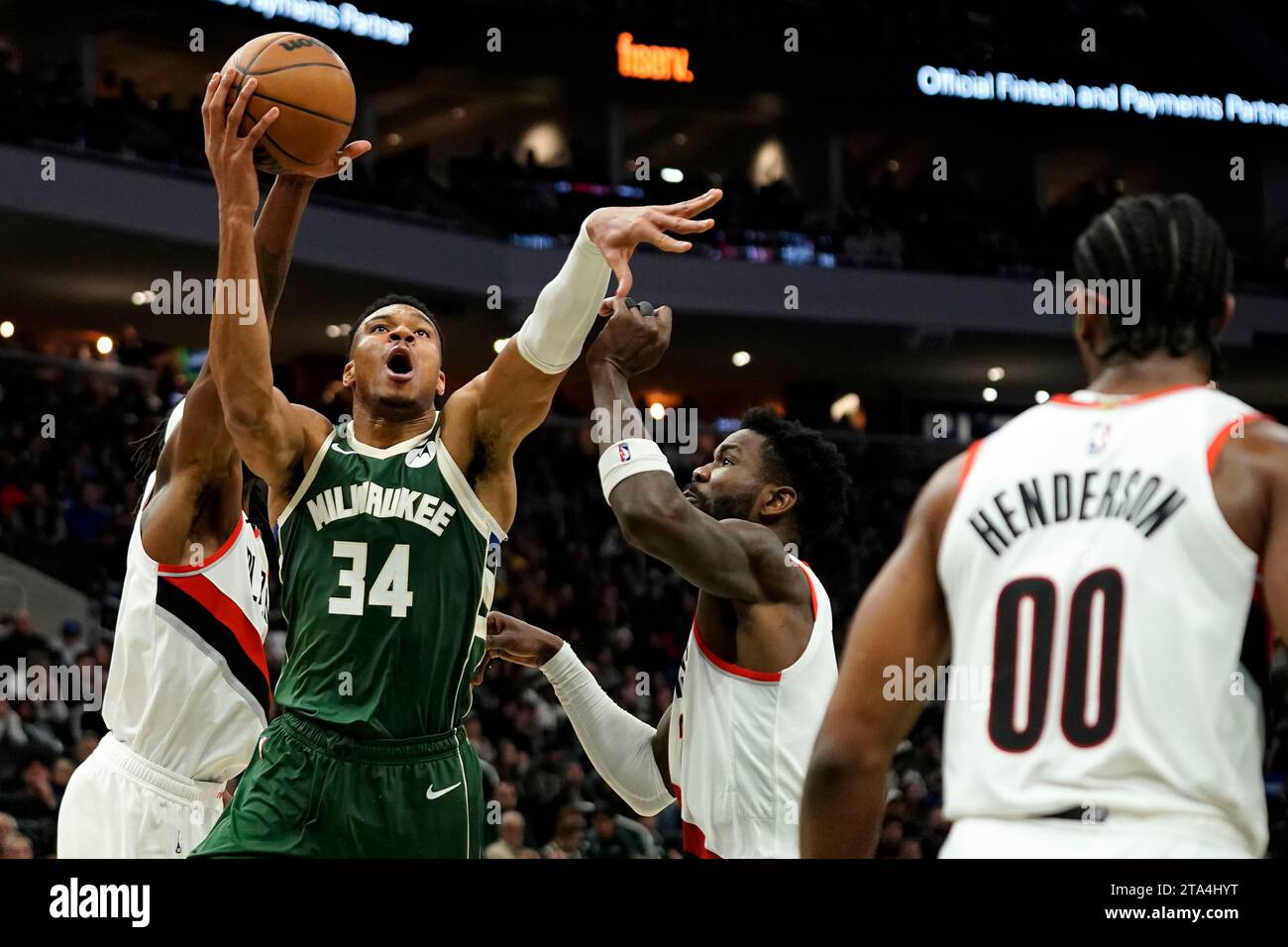 Milwaukee Bucks' Giannis Antetokounmpo (34) shoots between Portland ...