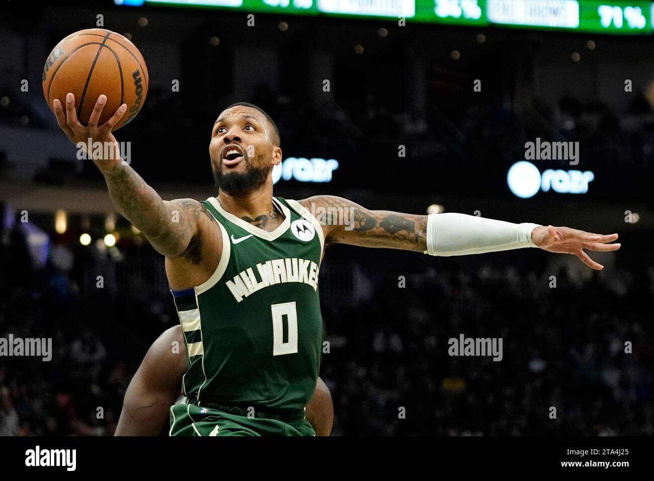 Milwaukee Bucks' Damian Lillard shoots a layup during the second half ...