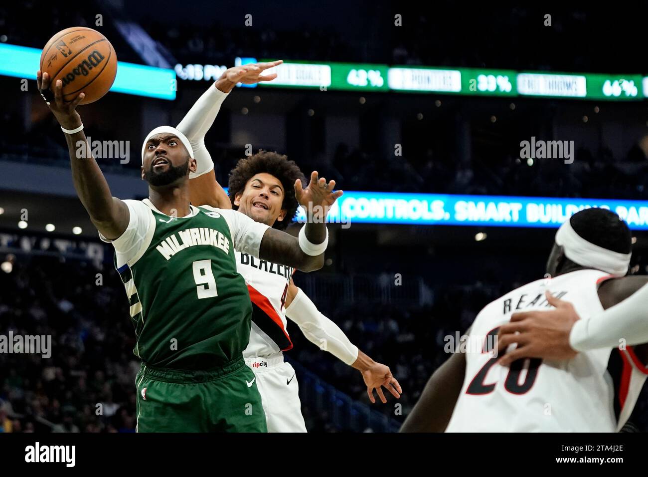 Milwaukee Bucks' Bobby Portis (9) shoots past Portland Trail Blazers ...