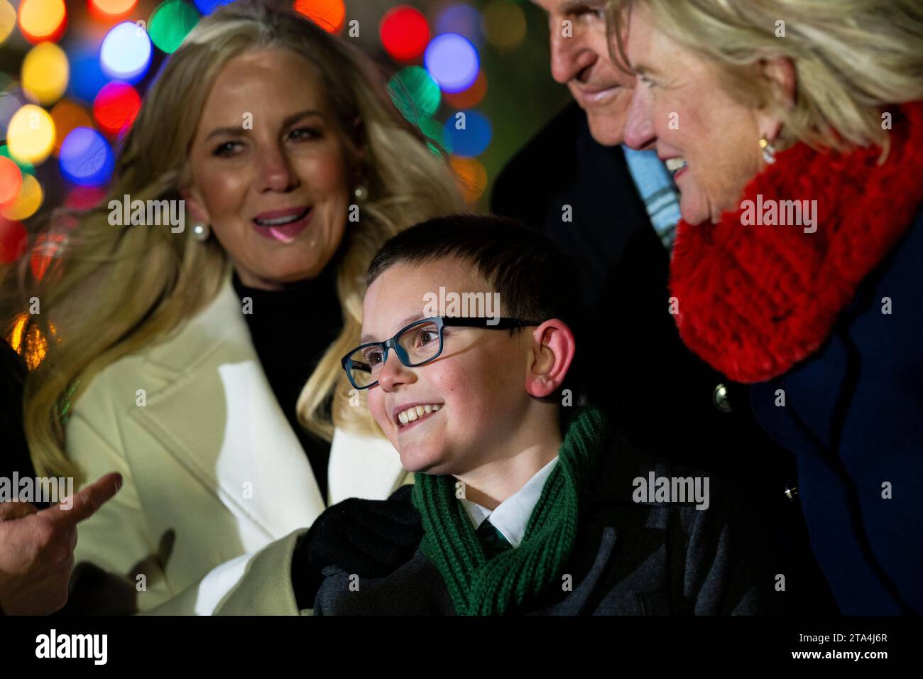 Washington, USA. 28th Nov, 2023. Tree lighter and fourth-grade student ...