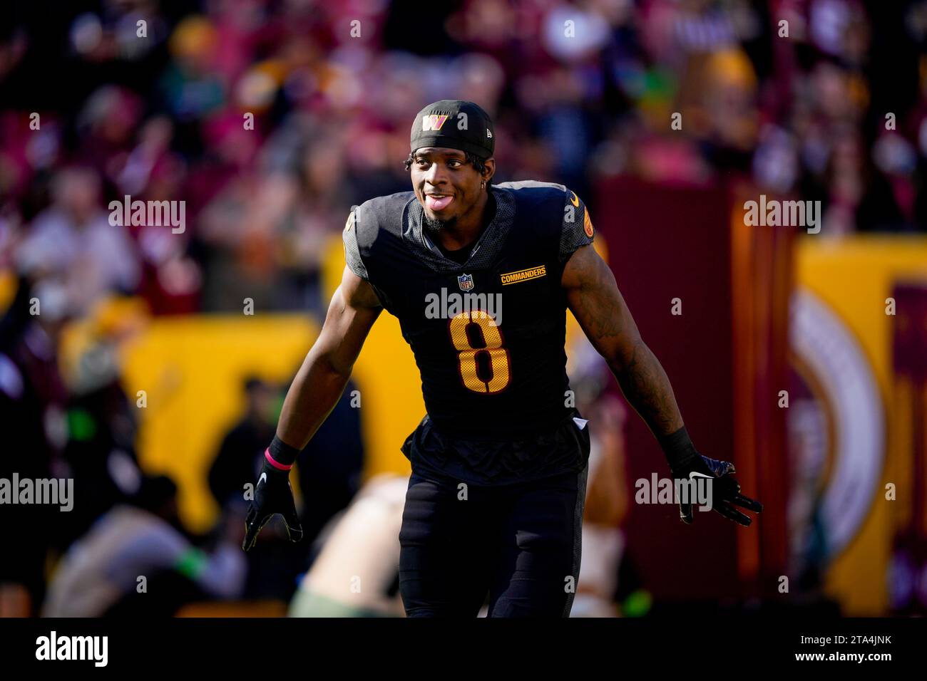 Washington Commanders running back Brian Robinson Jr. takes the field ...