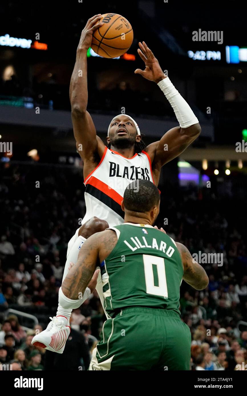 Portland Trail Blazers' Jerami Grant shoots over Milwaukee Bucks ...