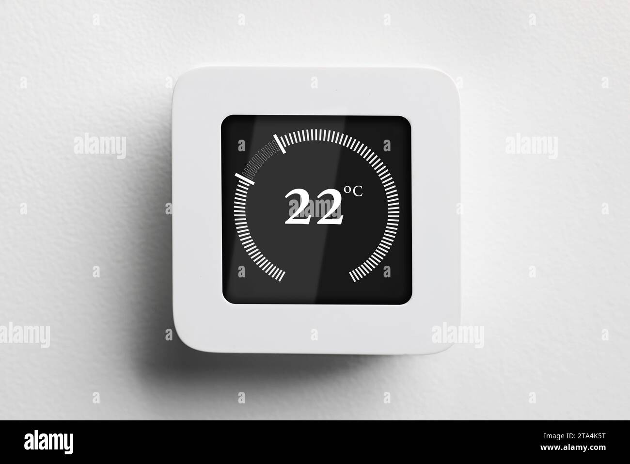 Thermostat displaying temperature in Celsius scale. Smart home device ...