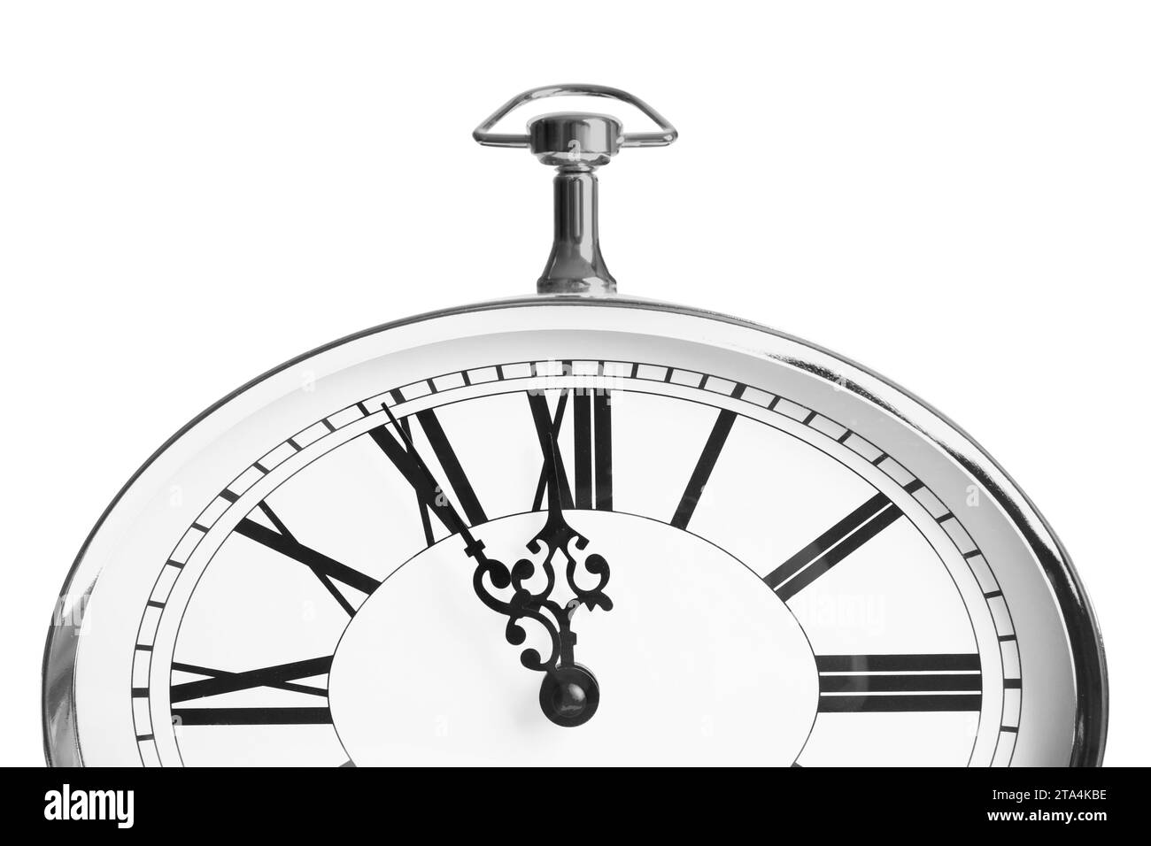Clock showing five minutes until midnight on white background, closeup ...