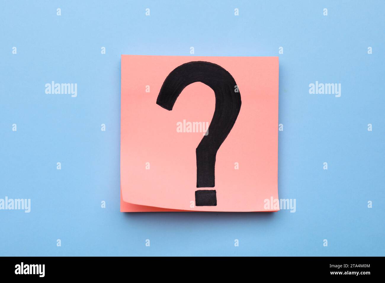 Sticky note with question mark on light blue background, top view Stock ...