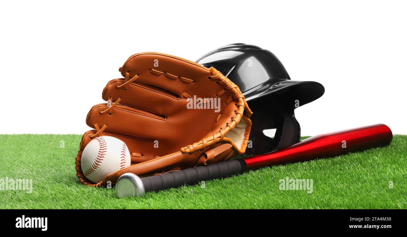 Baseball bat, ball, batting helmet and glove on artificial grass ...