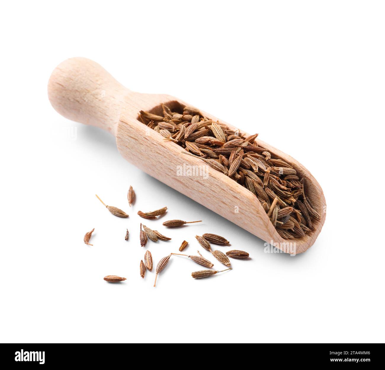 Scoop of aromatic caraway (Persian cumin) seeds isolated on white Stock ...