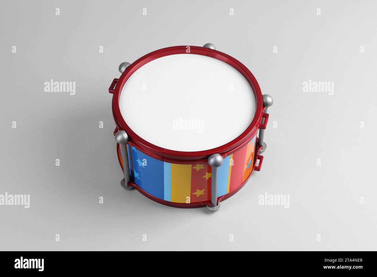 Colorful drum on light background. Percussion musical instrument Stock ...