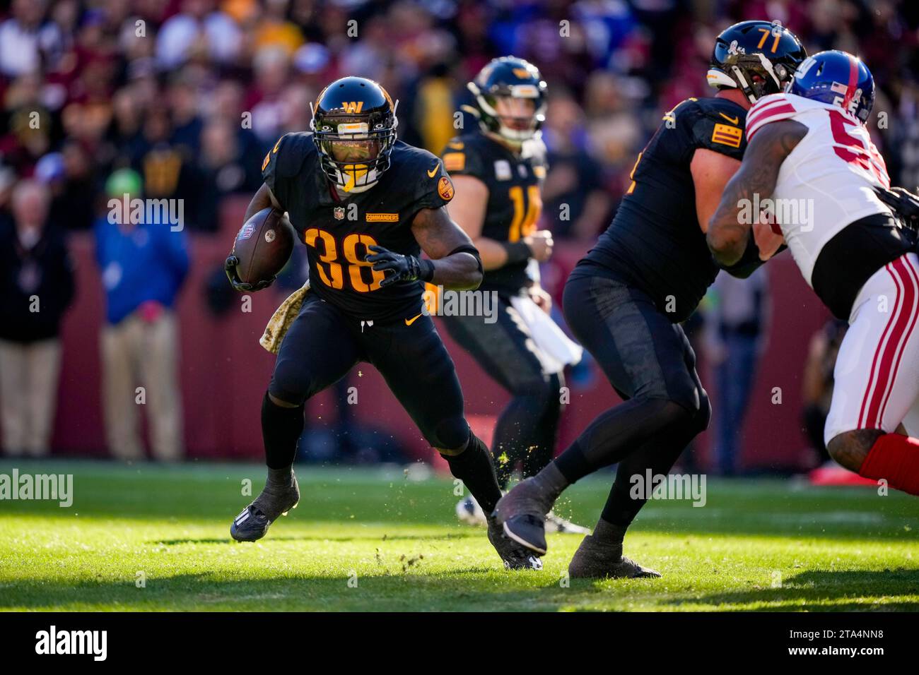 Washington Commanders running back Derrick Gore runs during an NFL ...