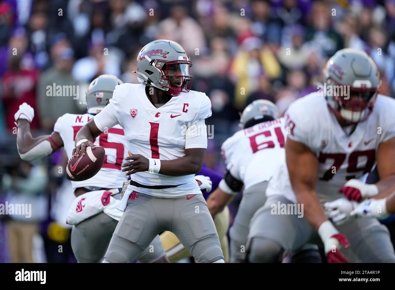 Washington State quarterback Cameron Ward looks to throw against ...