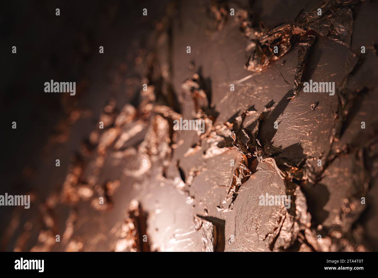 Delicious close-up of smooth, shiny chocolate with dark background and ...