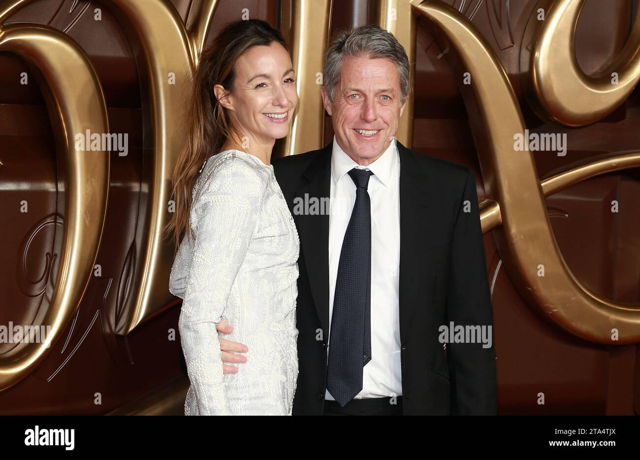 London, UK. 28th Nov, 2023. Anna Elisabet Eberstein and Hugh Grant ...
