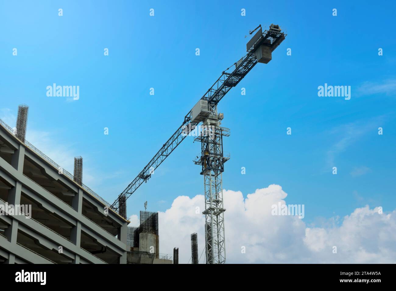 Crane on building construction site with blue sky background Stock ...