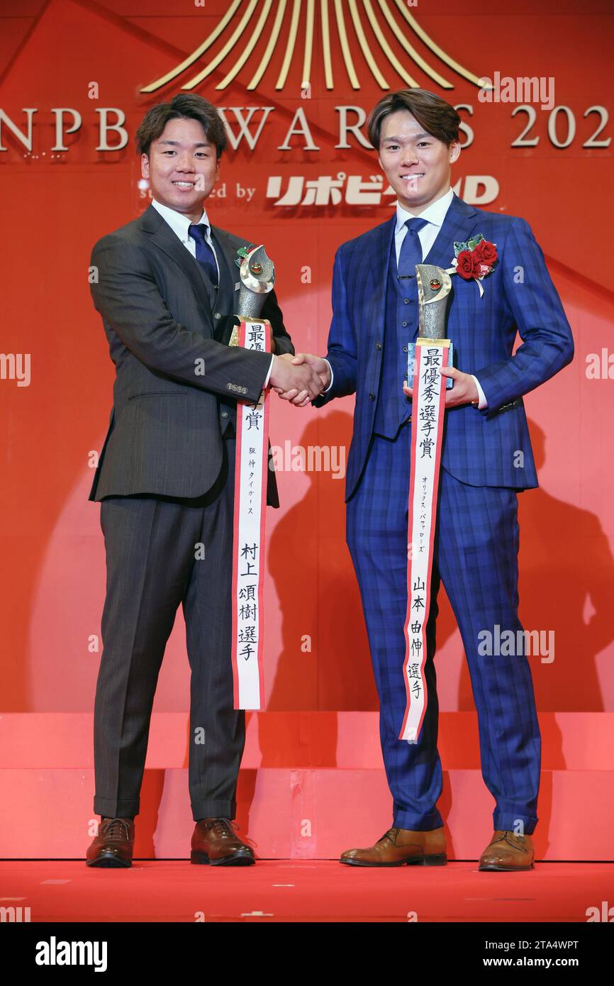 Orix Buffaloes pitcher Yoshinobu Yamamoto (R) and Hanshin Tigers ...